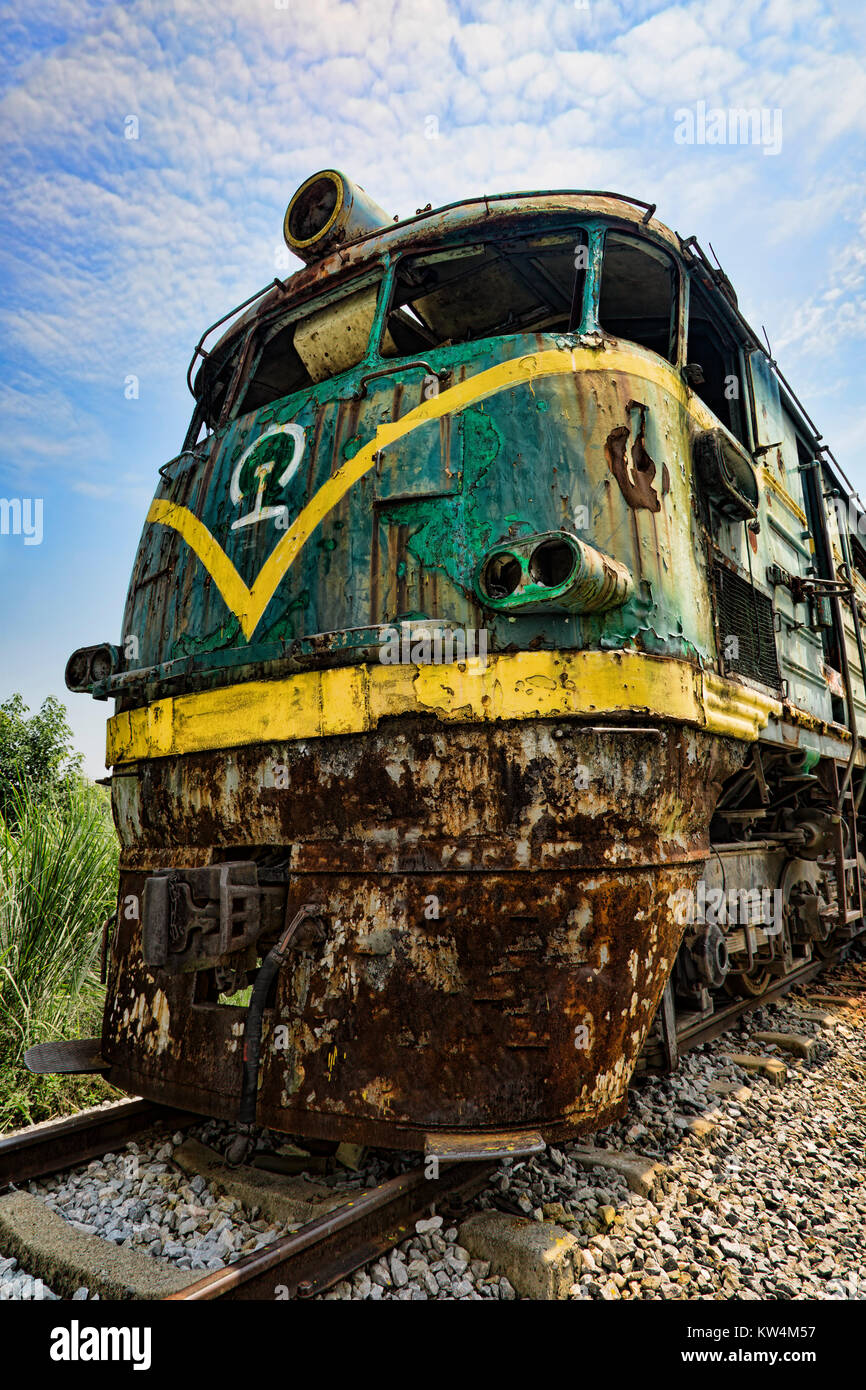 An old abandoned train locomotive at a railway station in Guilin ...