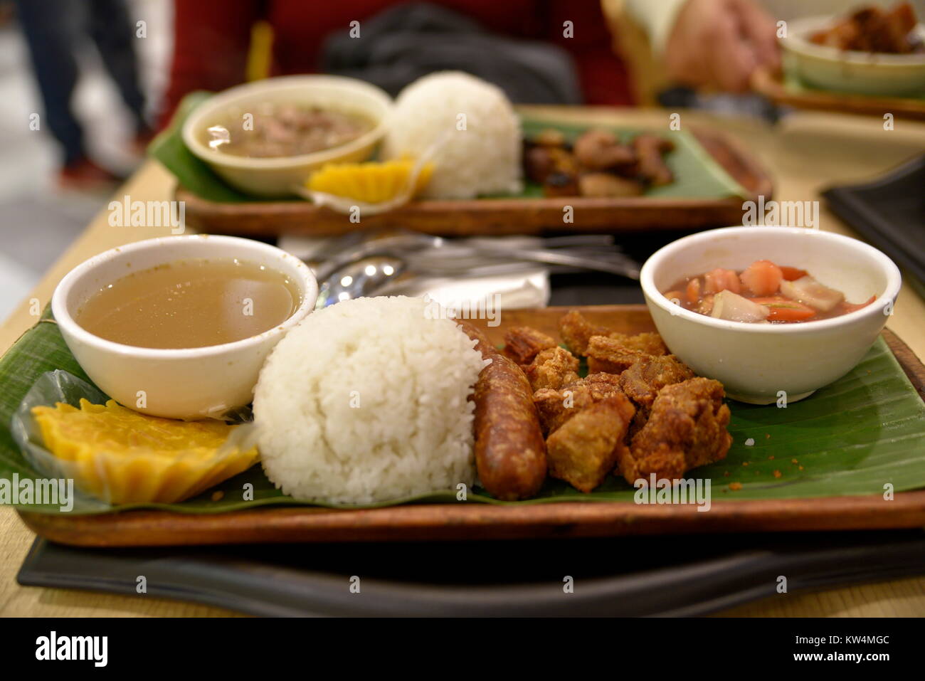 Pilipino traditional cuisine, Pizza and Pasta on the table Stock Photo ...