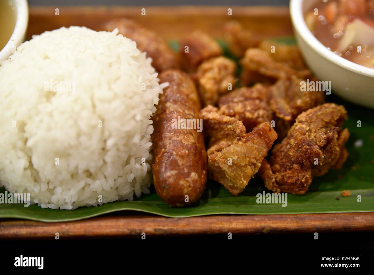 Pilipino traditional cuisine, Pizza and Pasta on the table Stock Photo ...
