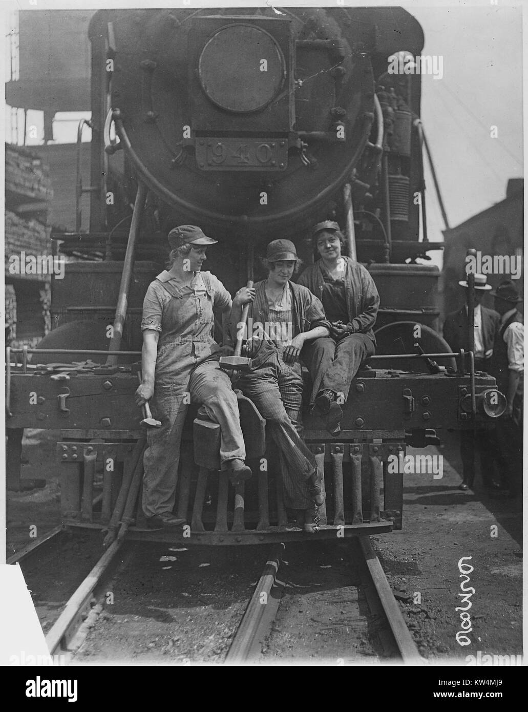 Photograph of three women who work at the Bush Terminal rail yard ...