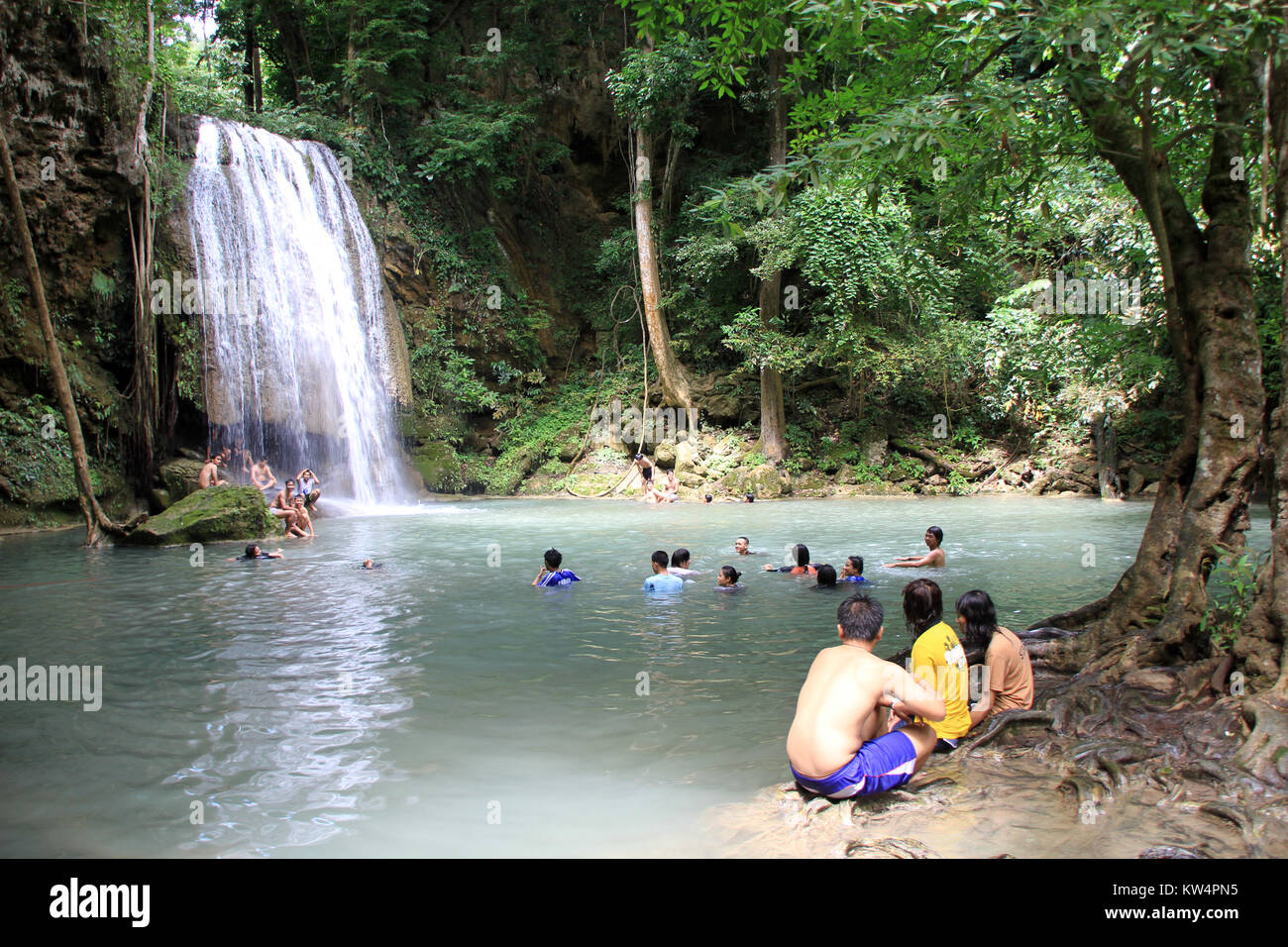 People swim in the pool near waterfall Erawan, Thailand Stock Photo - Alamy