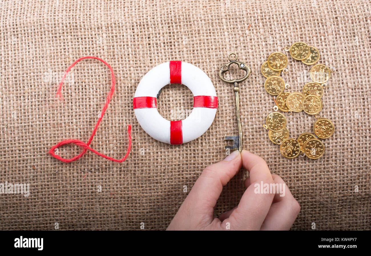 New Year 2018 decoration with life preserver, coins and a key Stock ...