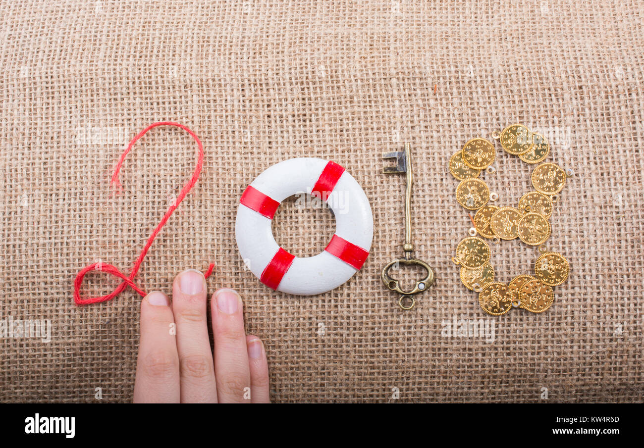 New Year 2018 decoration with life preserver, coins and a key Stock ...