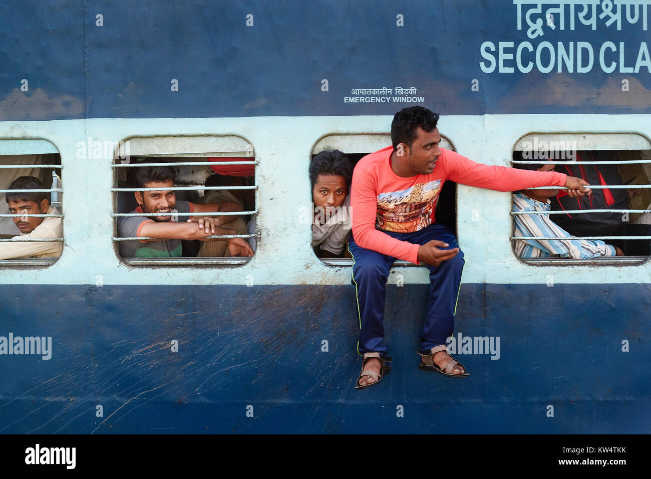 Indian men at train windows, Mathura train station, India test Stock ...