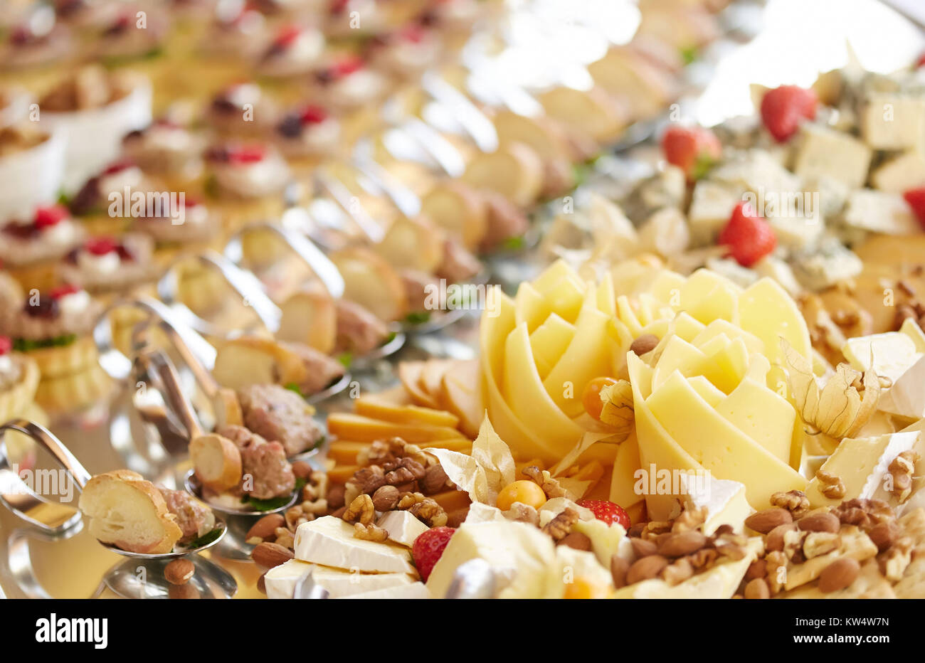 Different meals and snacks on a table Stock Photo - Alamy
