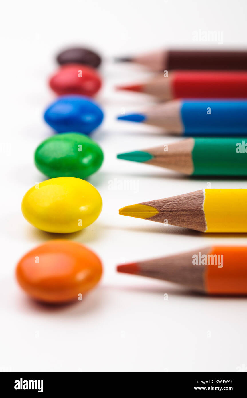 Colorful candys and penciles Stock Photo - Alamy