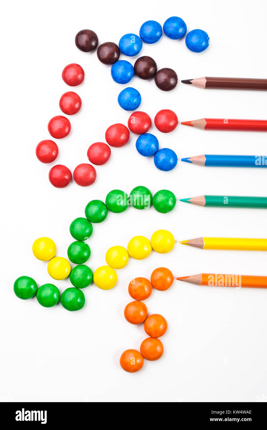 Colorful candys and penciles Stock Photo - Alamy