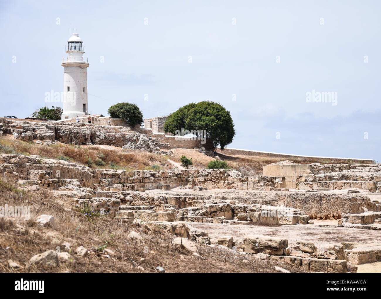 Paphos lighthouse viewed from the ruins at Paphos Archeological park ...