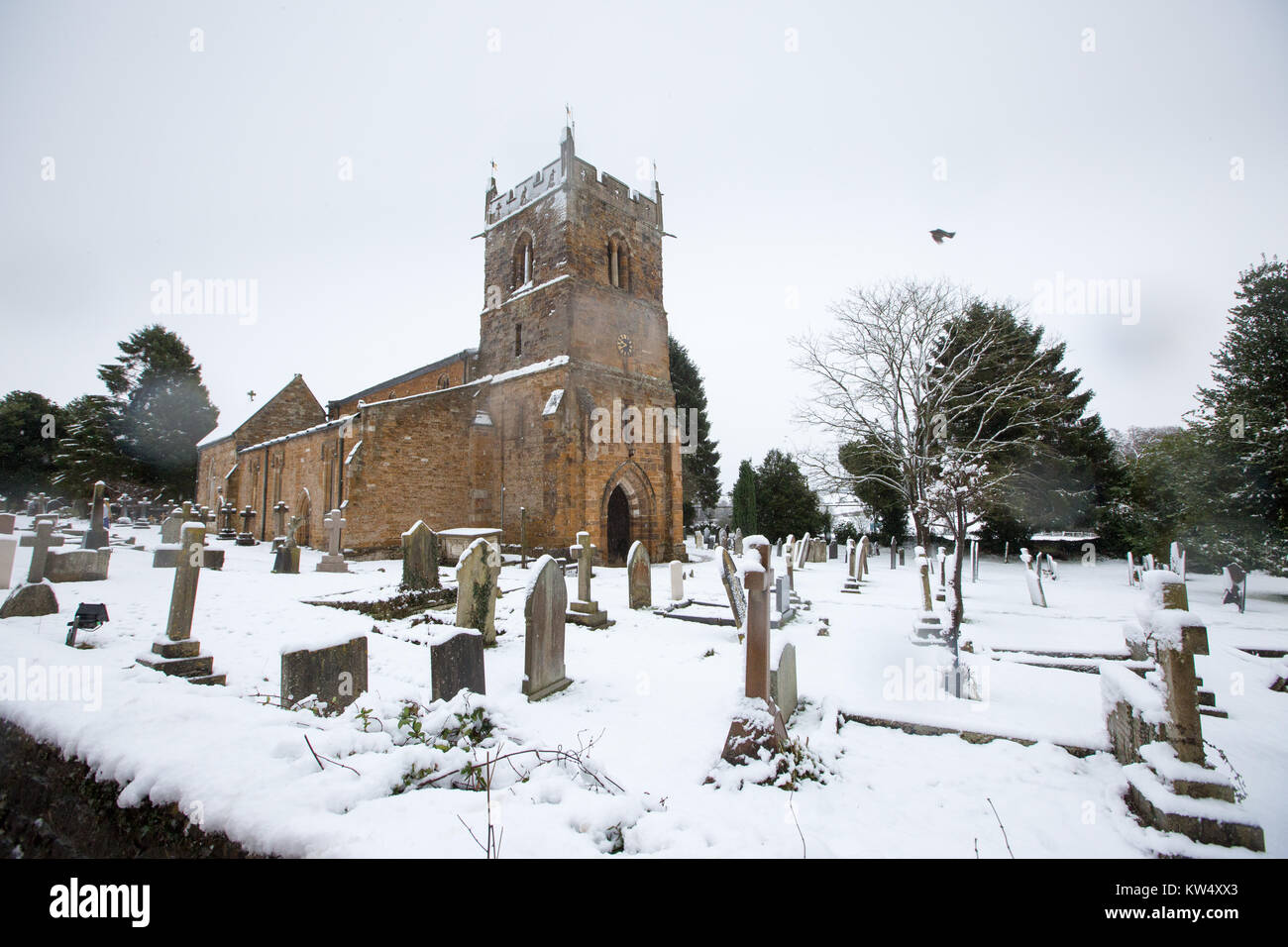 Church and graveyard covered in snow in Rushton,Northants Stock Photo ...