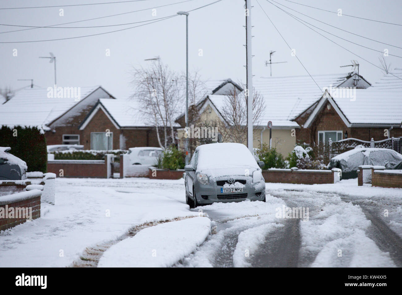Snow on the road on December 27th after overnight snow caused numerous ...