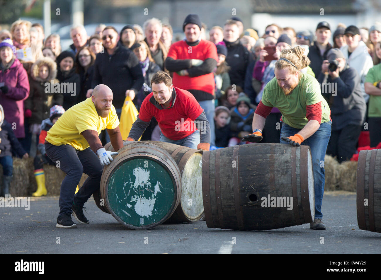 Picture shows competitors trying to control their barrel in the annual ...
