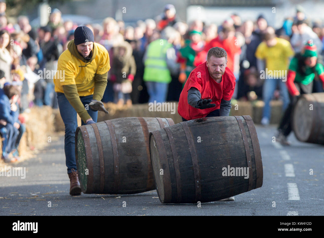 Picture shows competitors trying to control their barrel in the annual ...