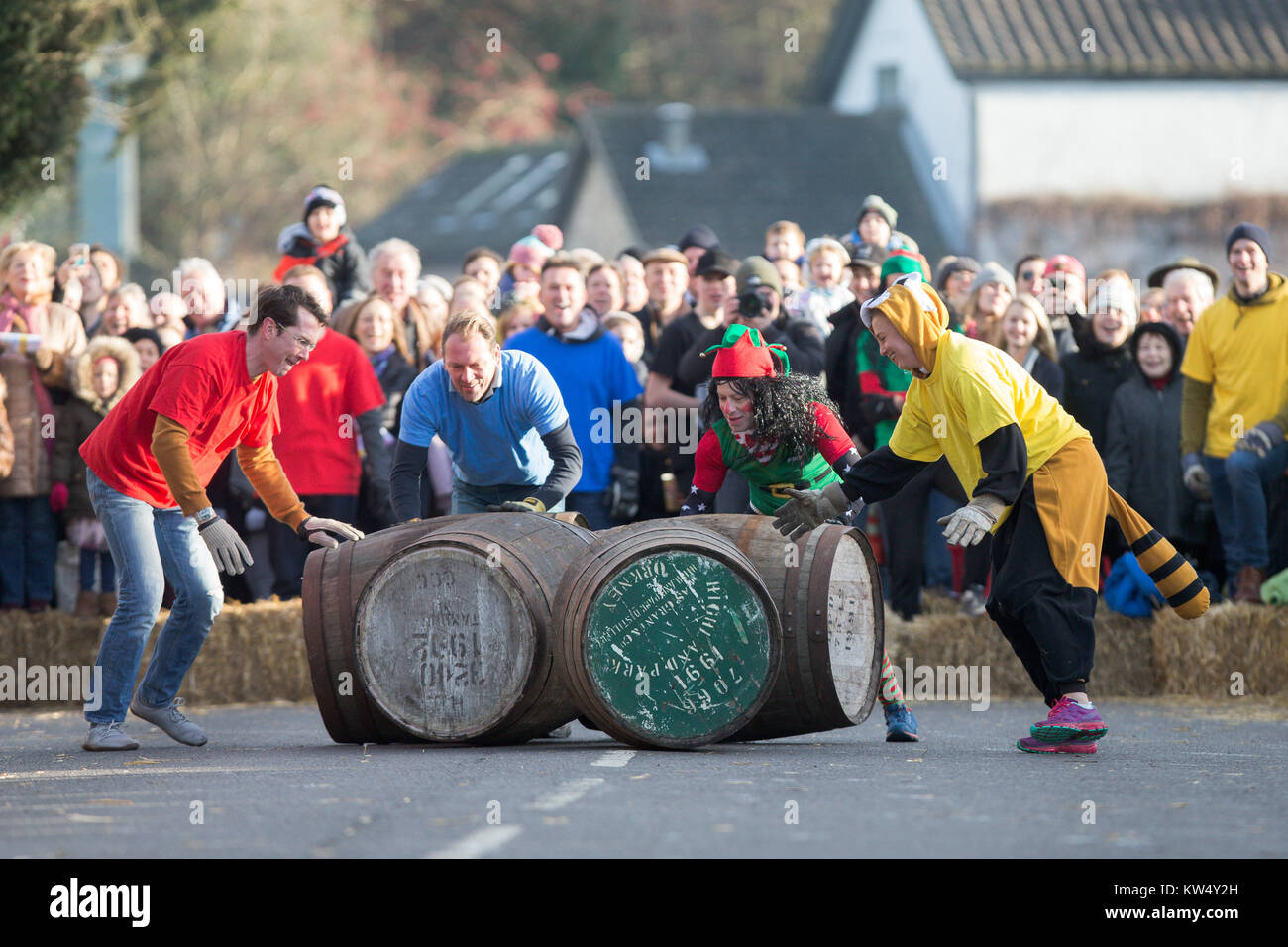 Picture shows competitors trying to control their barrel in the annual ...