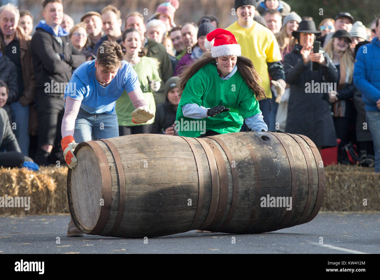 Picture shows competitors trying to control their barrel in the annual ...