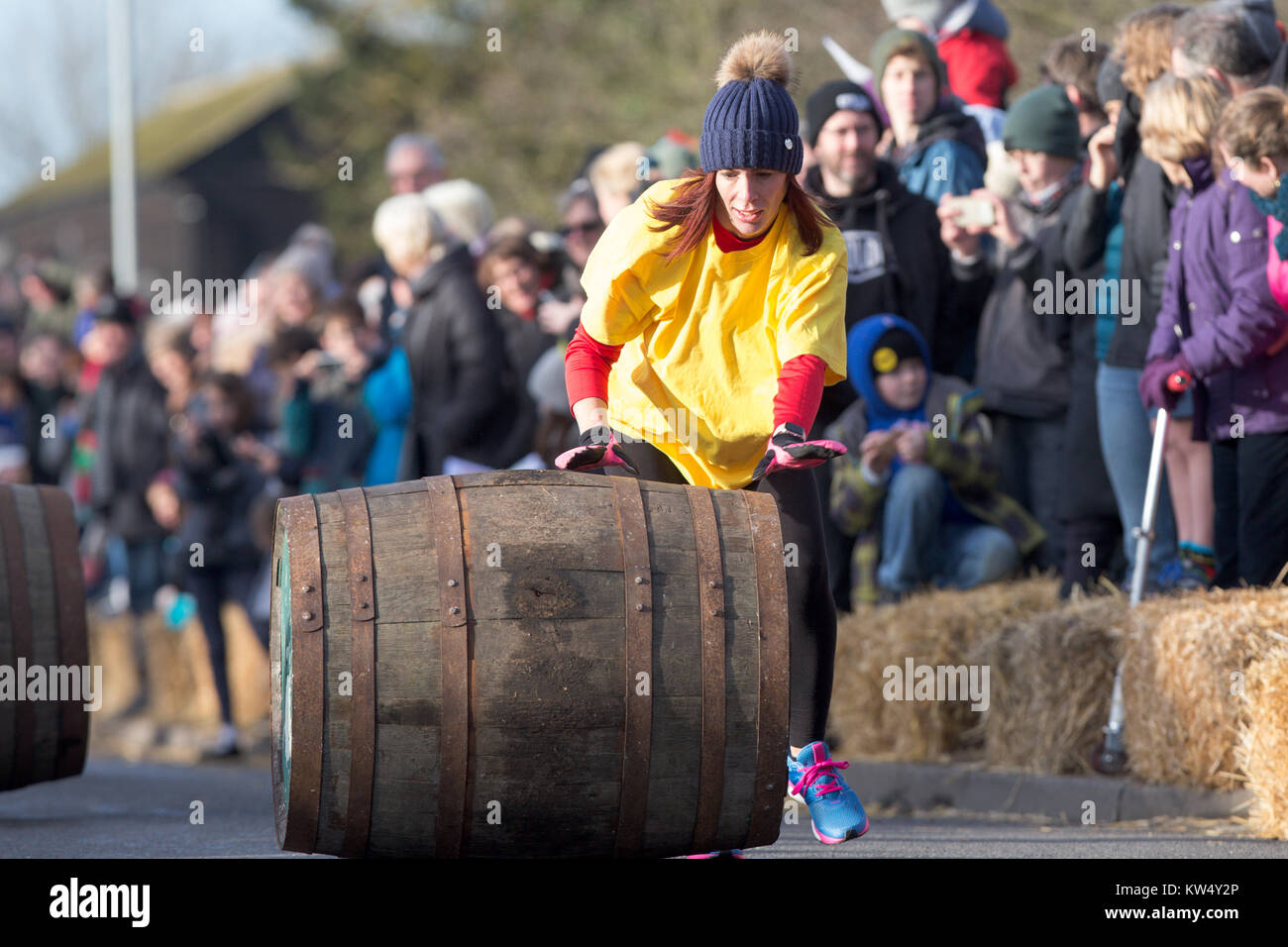 Picture shows competitors trying to control their barrel in the annual ...