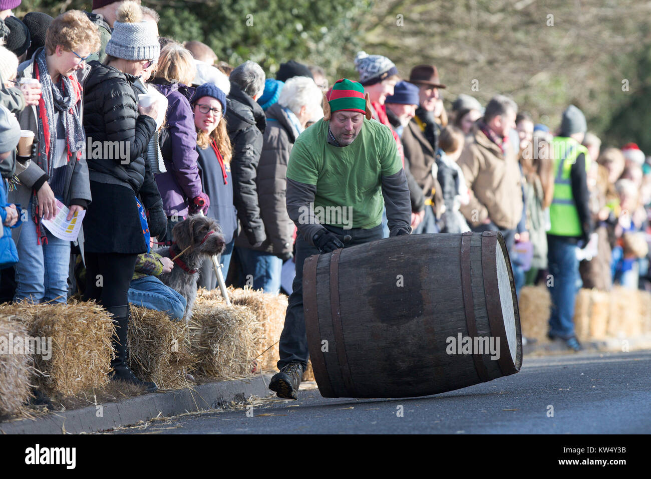 Picture shows competitors trying to control their barrel in the annual ...