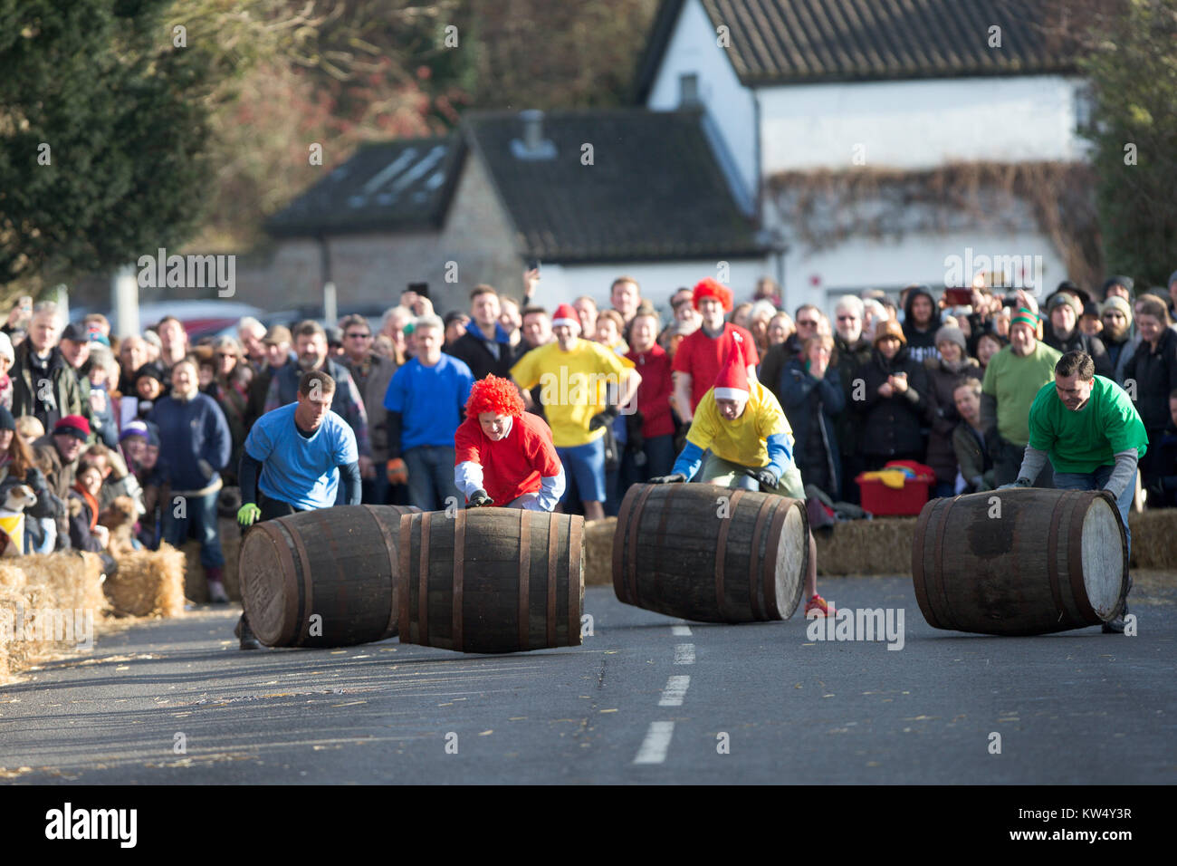 Picture shows competitors trying to control their barrel in the annual ...