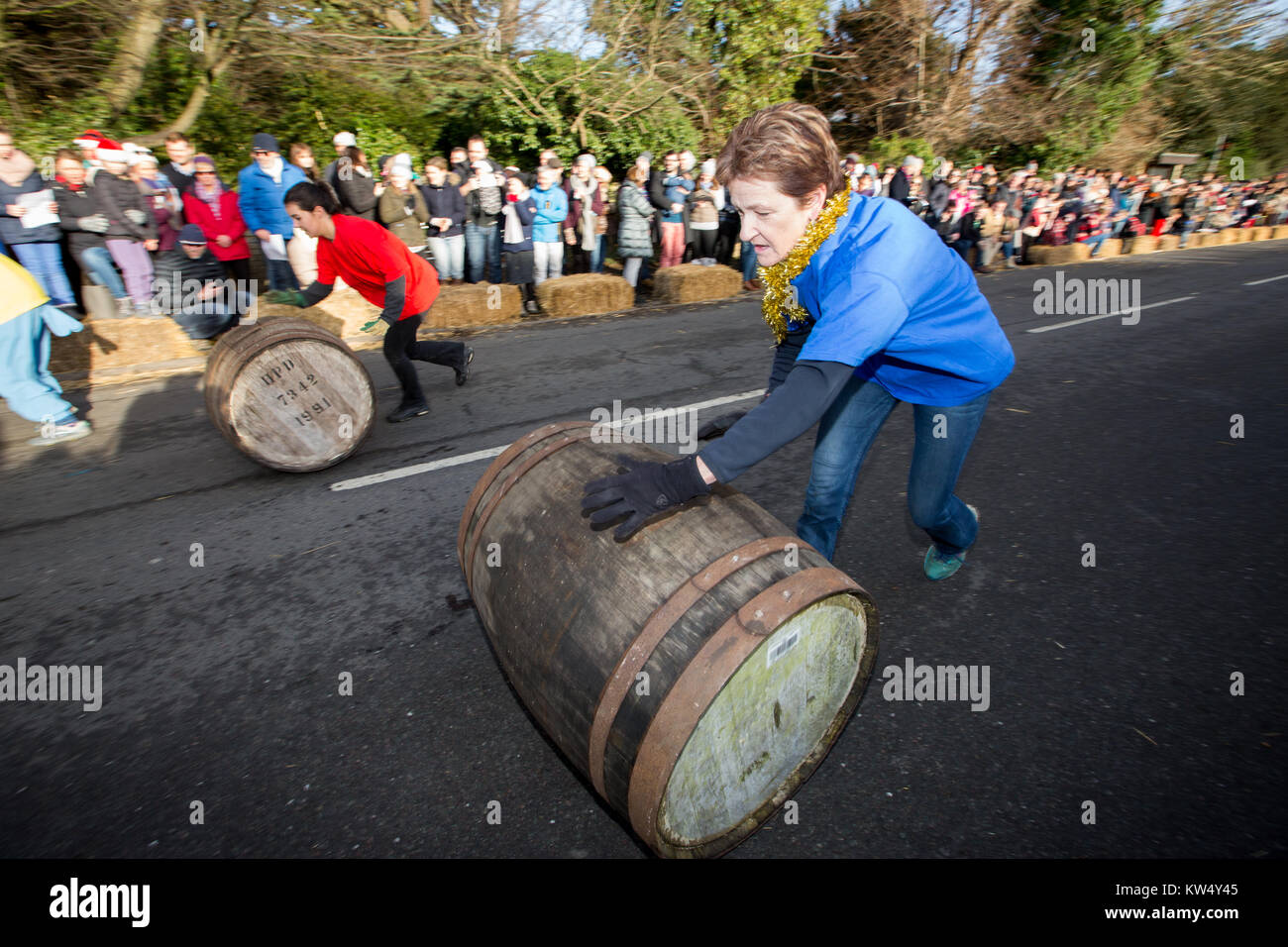 Picture shows competitors trying to control their barrel in the annual ...