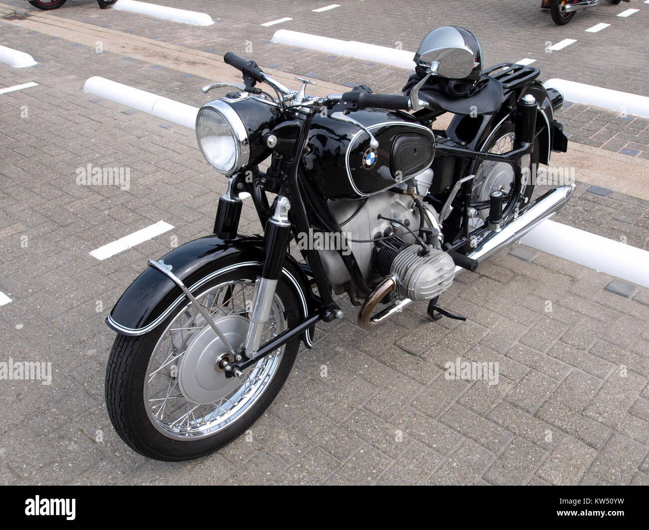 The image showcases the BMW R50/2 motorcycle, a classic design from the ...
