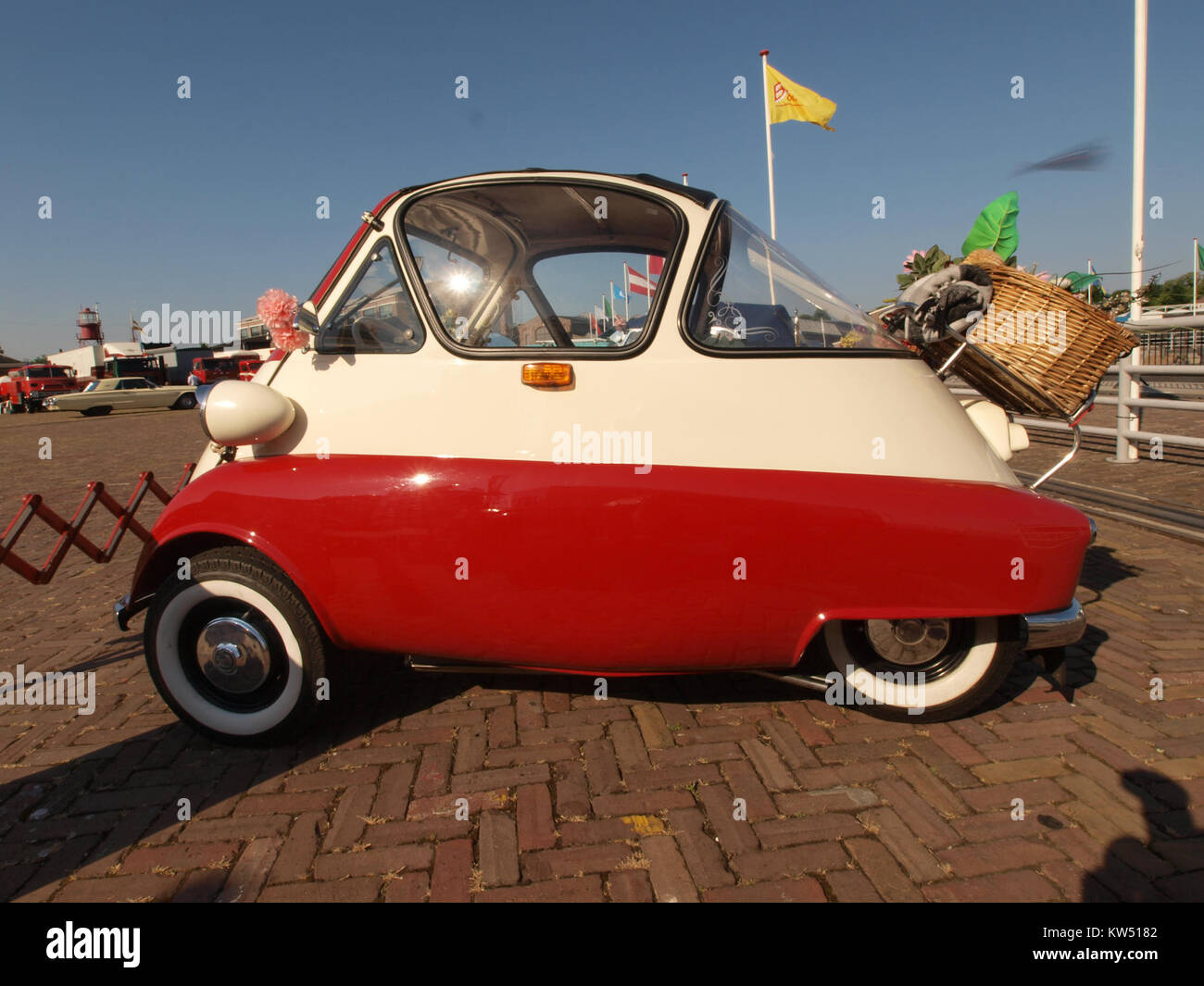 The BMW Isetta, produced in 1957, is a small, three-wheeled microcar ...