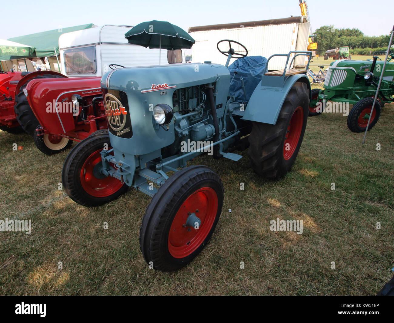 A blue Eicher diesel engine, luftgekühlt (air-cooled), is showcased in ...
