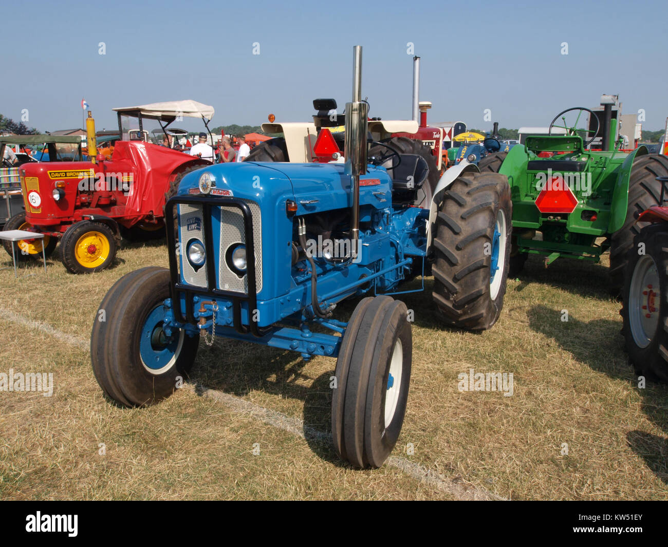 This image features a Blue Fordson Super Major tractor, a popular model ...