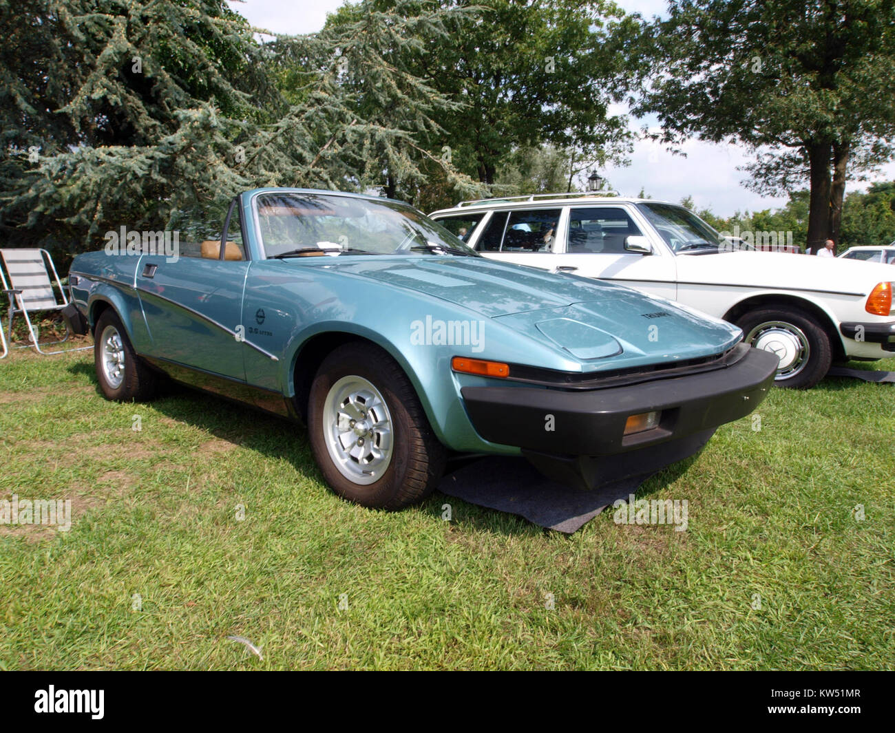 A Blue Triumph 3.5-liter P1, showcasing the elegance and performance of ...