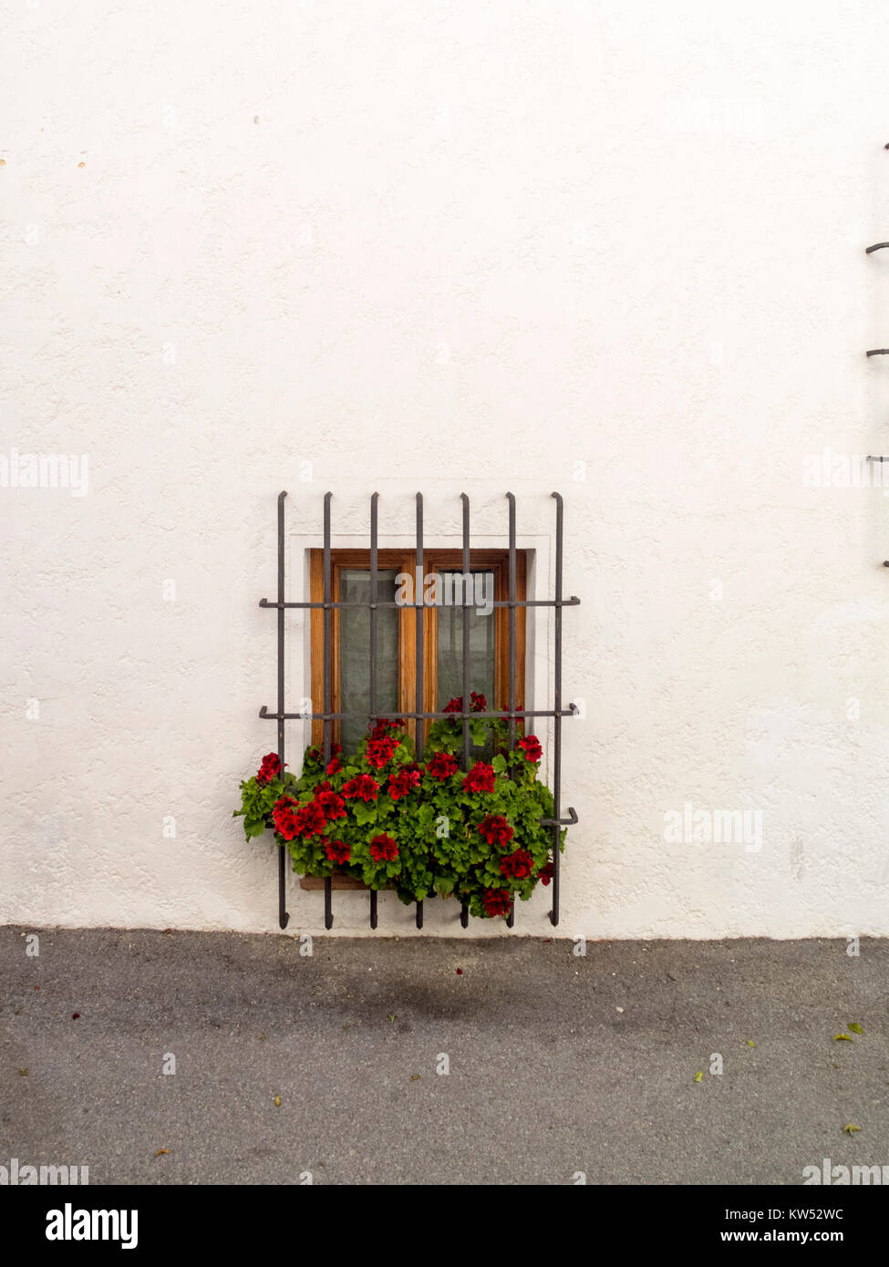 grated window on the bottom of a wall in Altea La Vella, Alicante ...