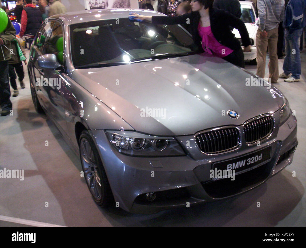 A photograph of a BMW 320d (E90) from 2011, featuring the front view of ...