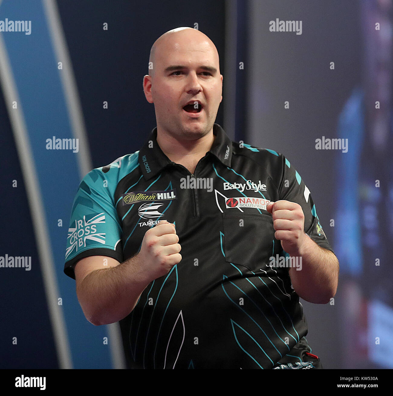 Rob Cross celebrates during day thirteen of the William Hill World ...