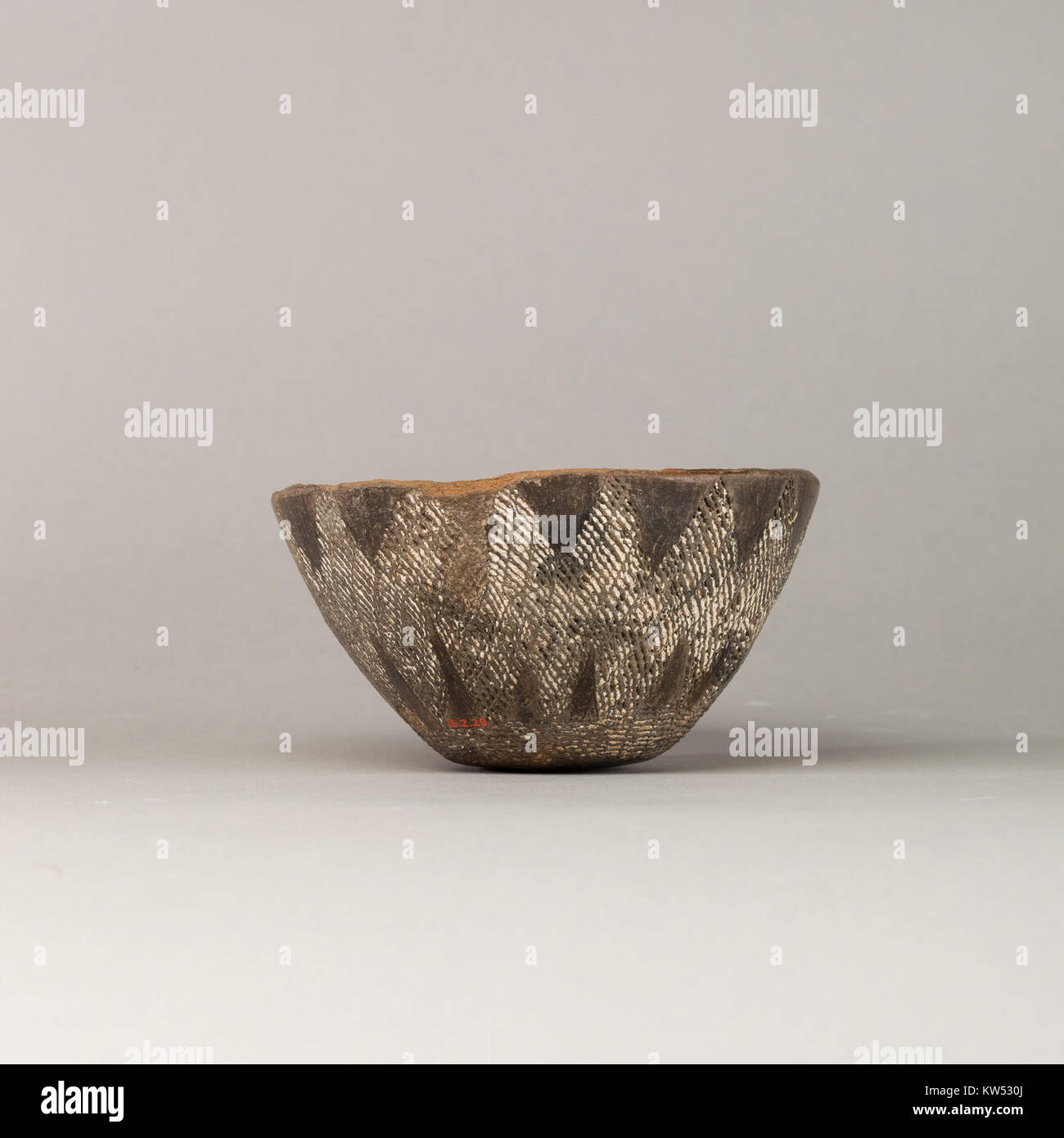 The Black Incised Ware Bowl is an ancient artifact held in the ...