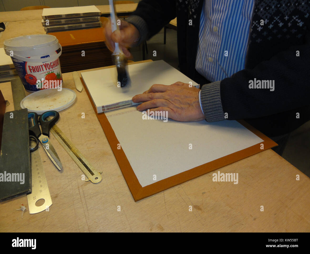 This image depicts a bookbinding club in Dukenburg, showcasing the ...