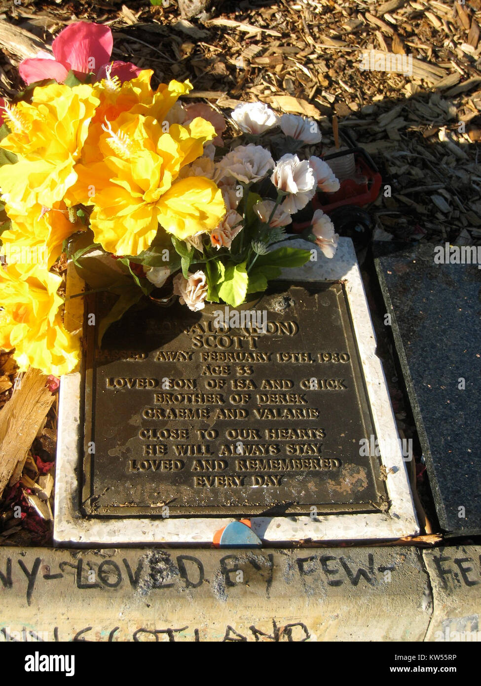The grave marker of Bon Scott, the legendary lead singer of AC/DC, is ...