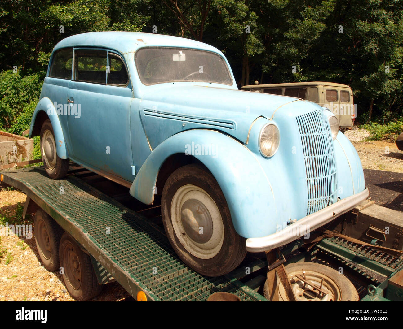 A vintage blue car, often referred to as an oldtimer, captured in a ...
