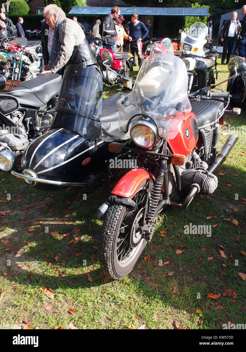 This photograph showcases a BMW R60 motorcycle with a sidecar, a ...