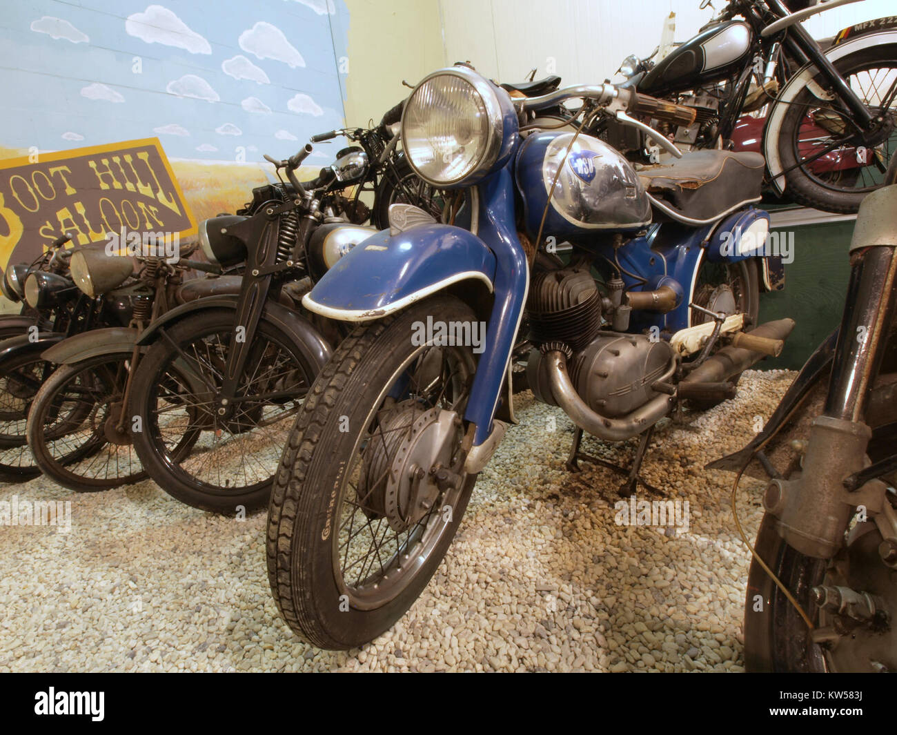 A blue and silver NSU motorcycle displayed at the Ford Museum ...