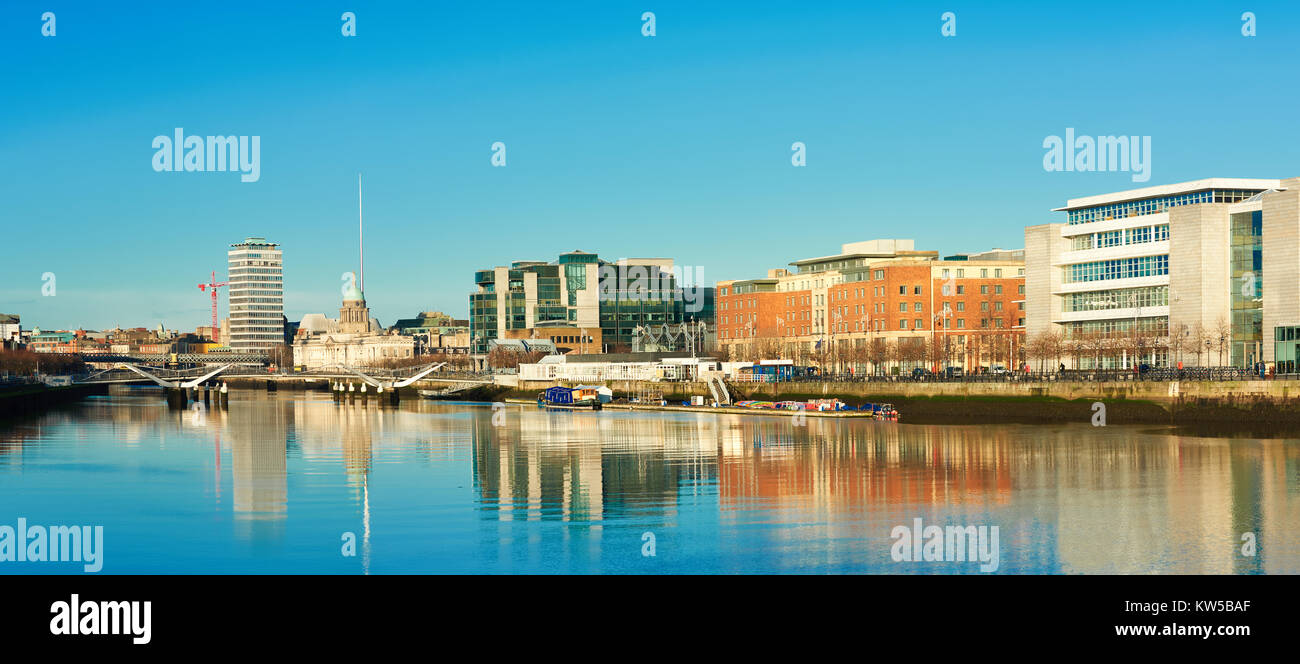 Dublin, Ireland, panoramic view over Liffey river with modern buildings ...