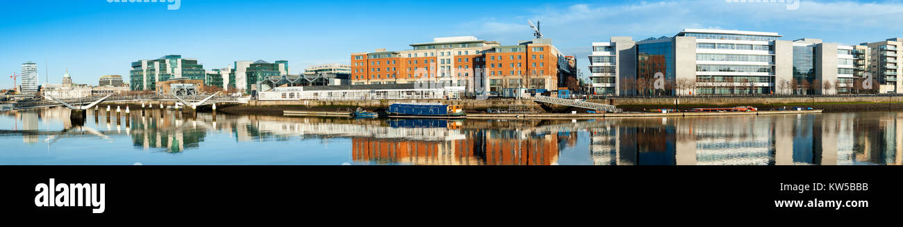 Dublin, Ireland, panoramic view over Liffey river with modern buildings ...