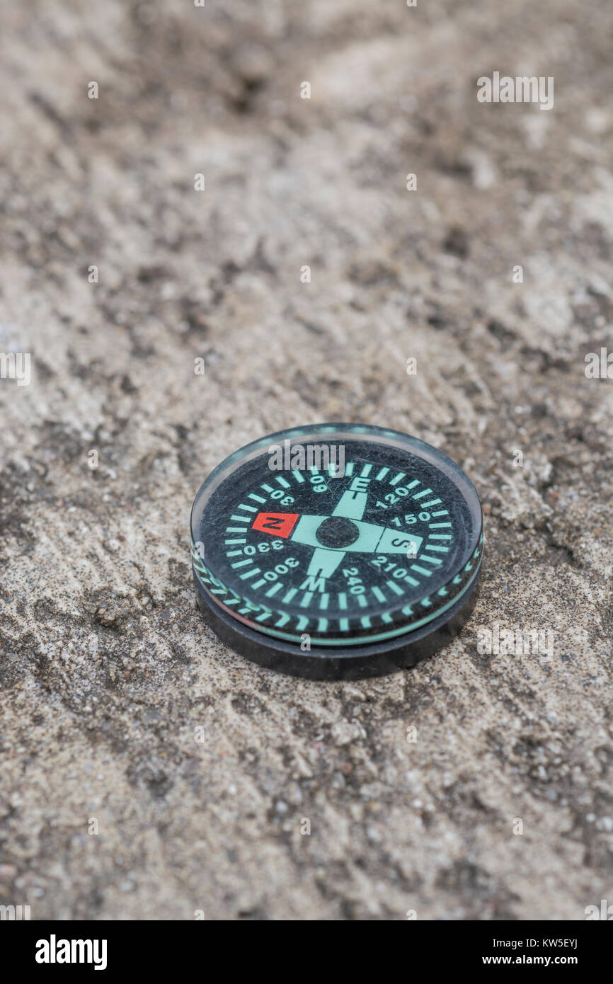 Button compass - metaphor for business 'direction', navigation, moral ...