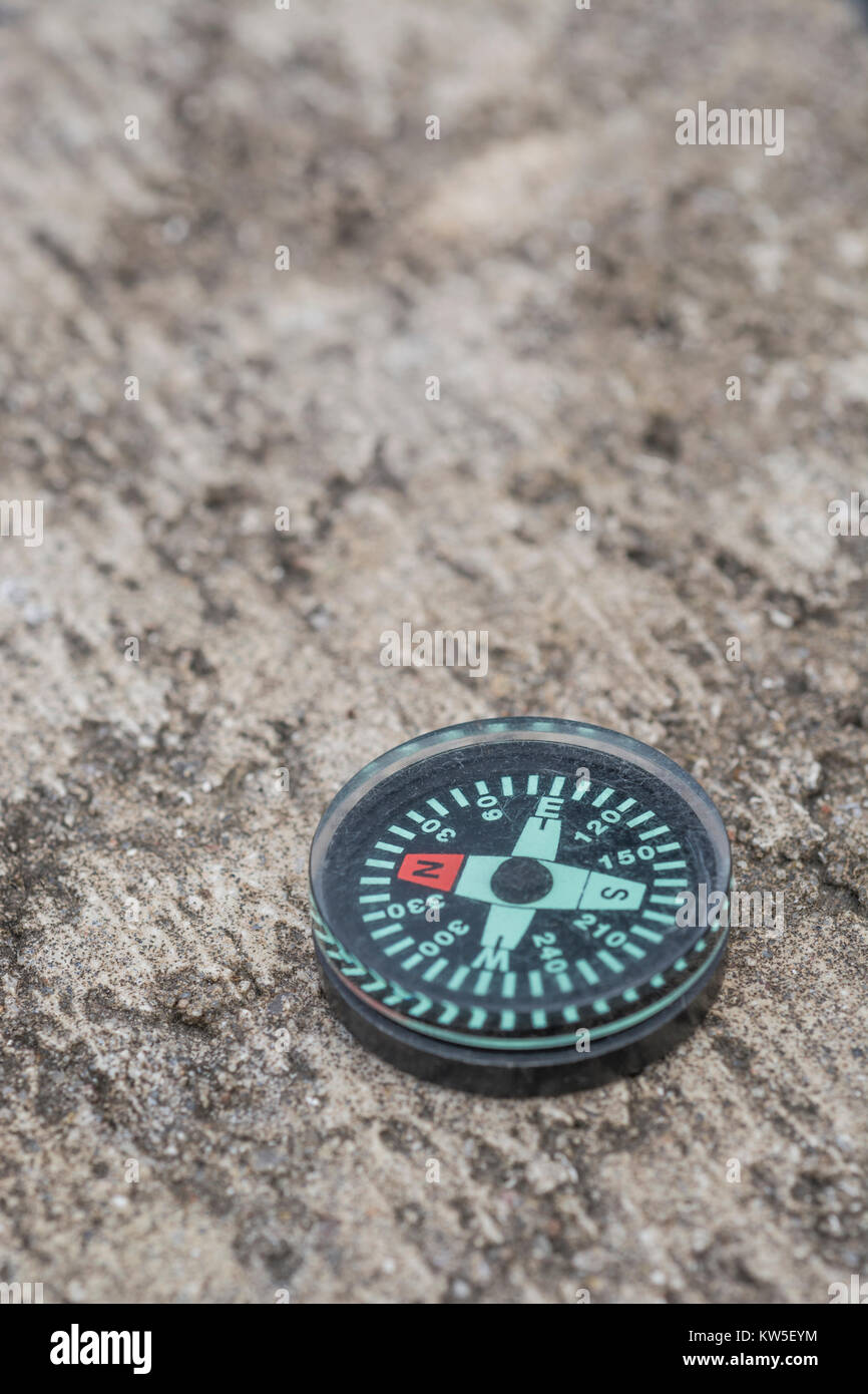 Button compass - metaphor for business 'direction', navigation, moral ...