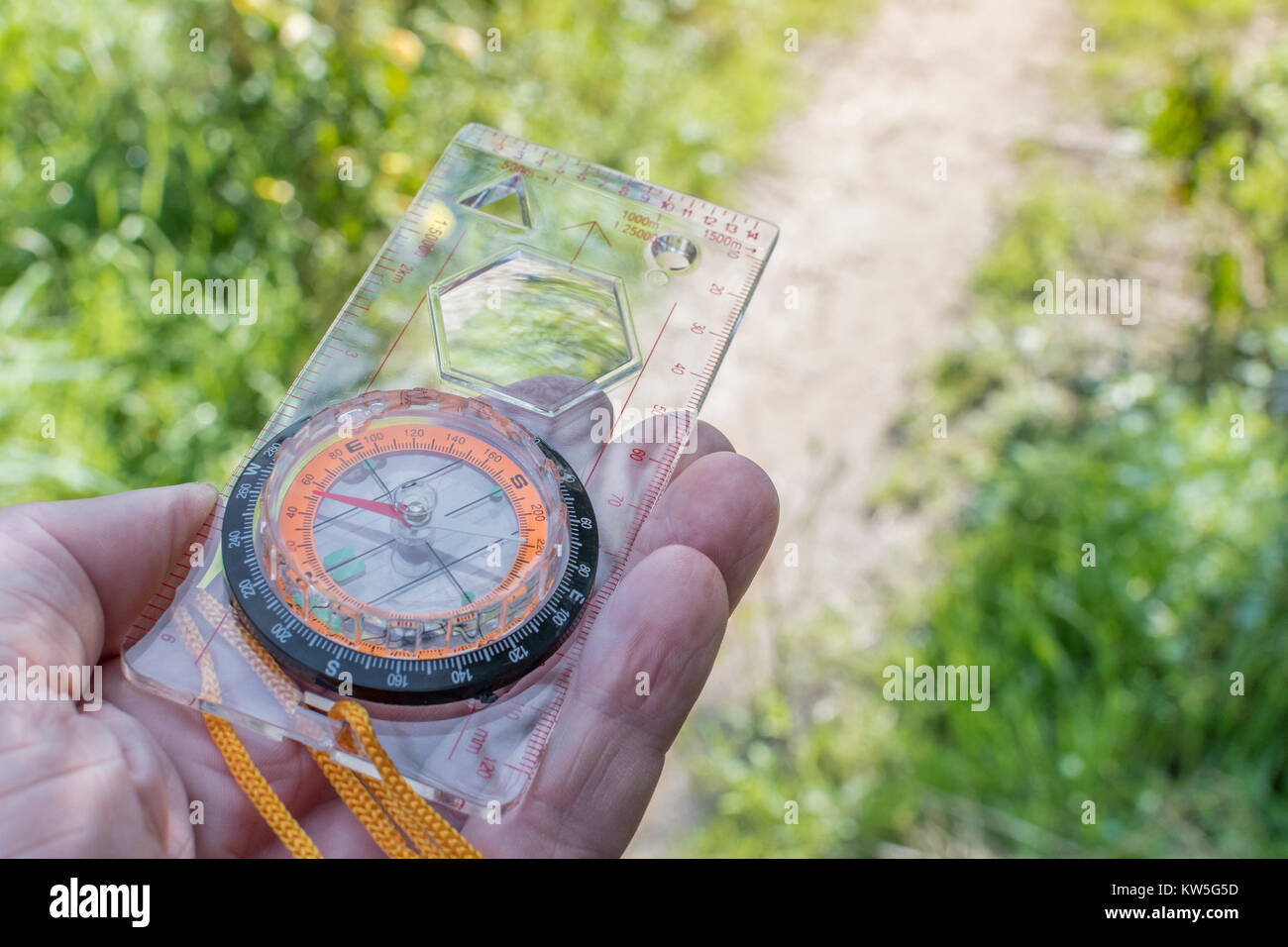 Orienteering Compass In Hand Pointing Ne For Business Direction Navigation Moral Compass