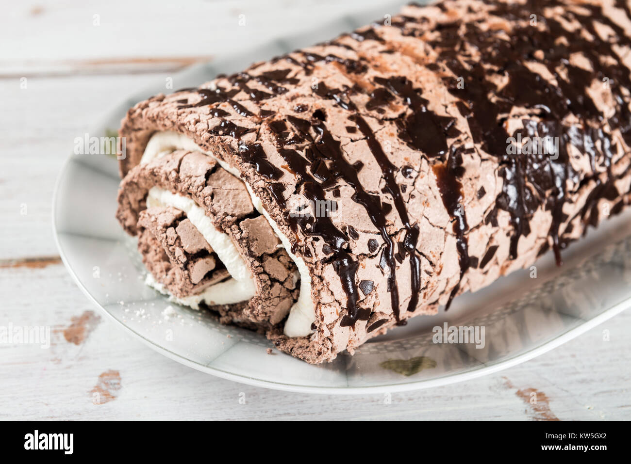 Belgian Chocolate Meringue Roulade filled with whipped cream and ...