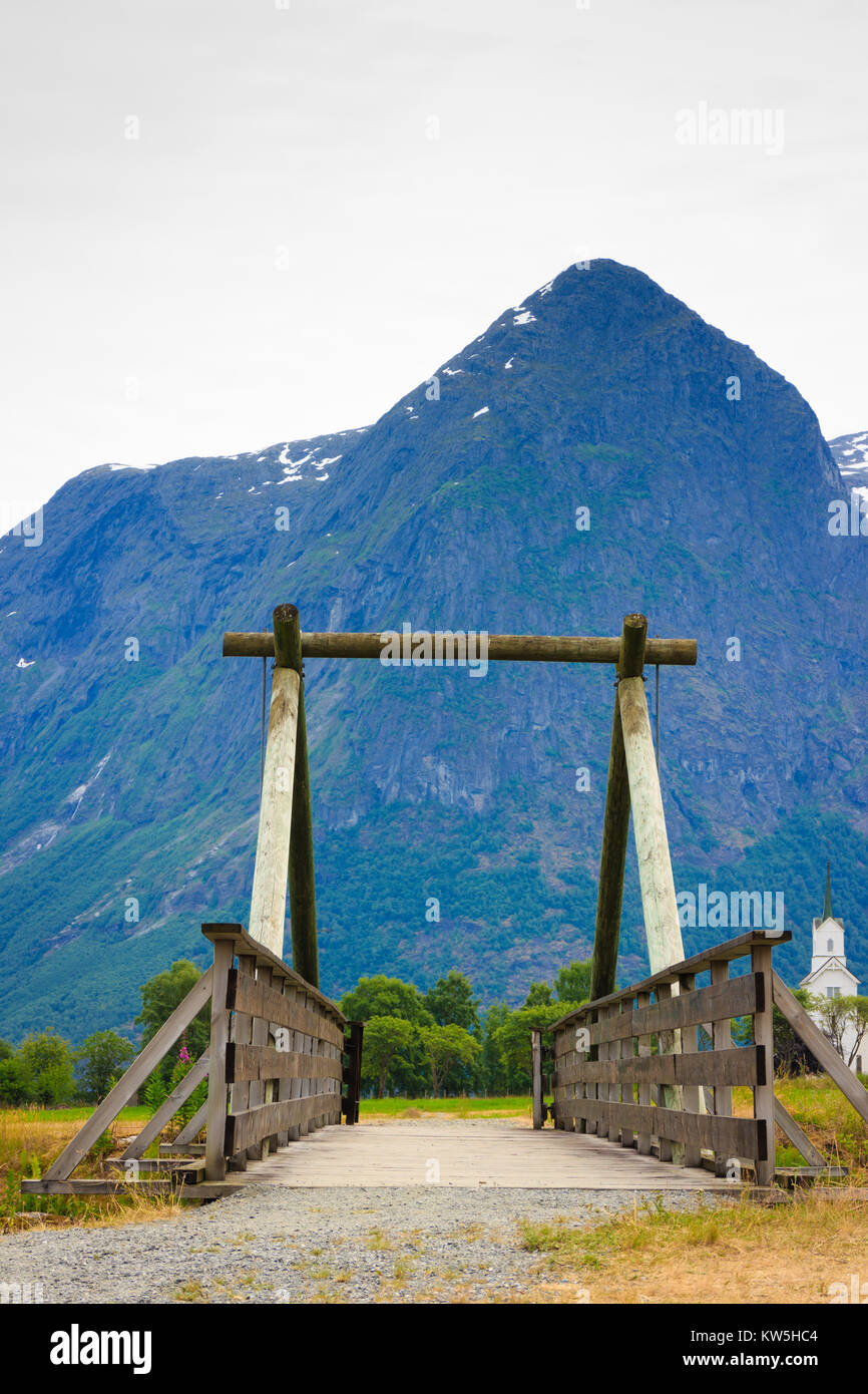 Tourism vacation and travel. Wooden bridge and mountains landscape in ...