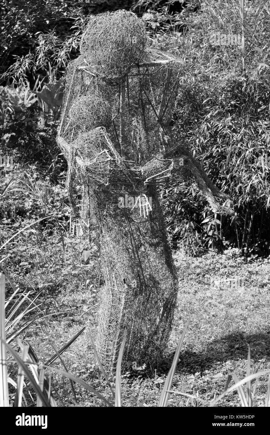 Landscape Art Sculpture of Mother & child in arms in wire mesh Stock ...