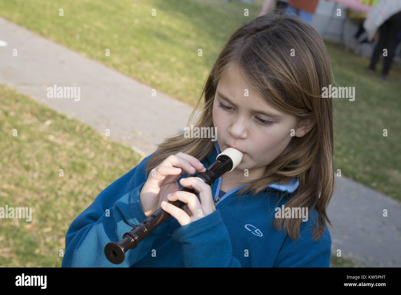 Children playing instruments school hi-res stock photography and images ...