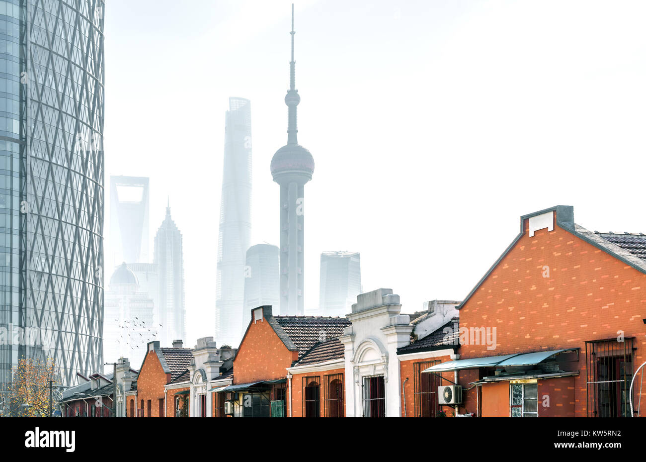 Traditional residential buildings and modern buildings, spanning a ...