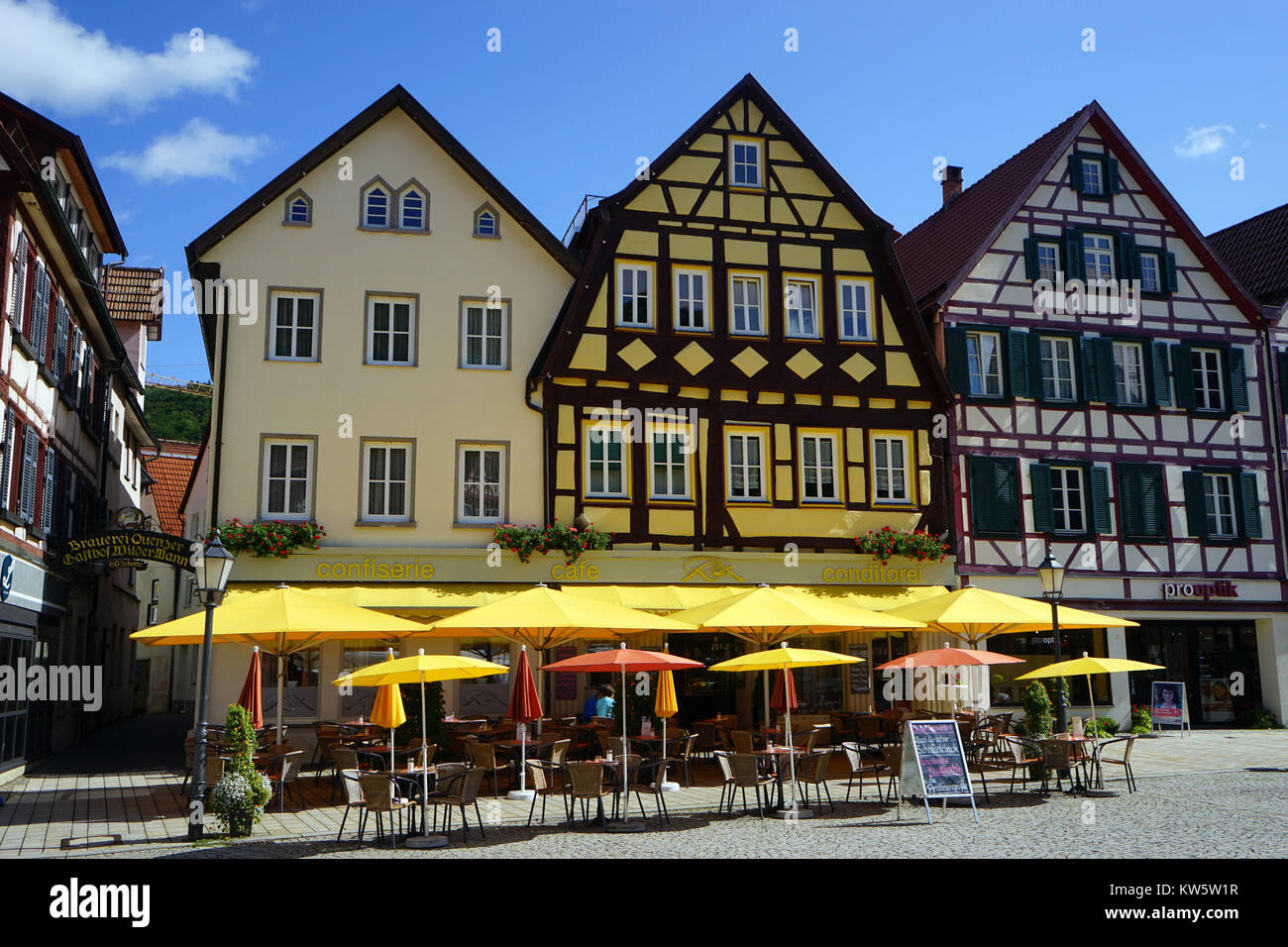 BAD URACH, GERMANY - CIRCA AUGUST 2015 Houses and cafe on the ...