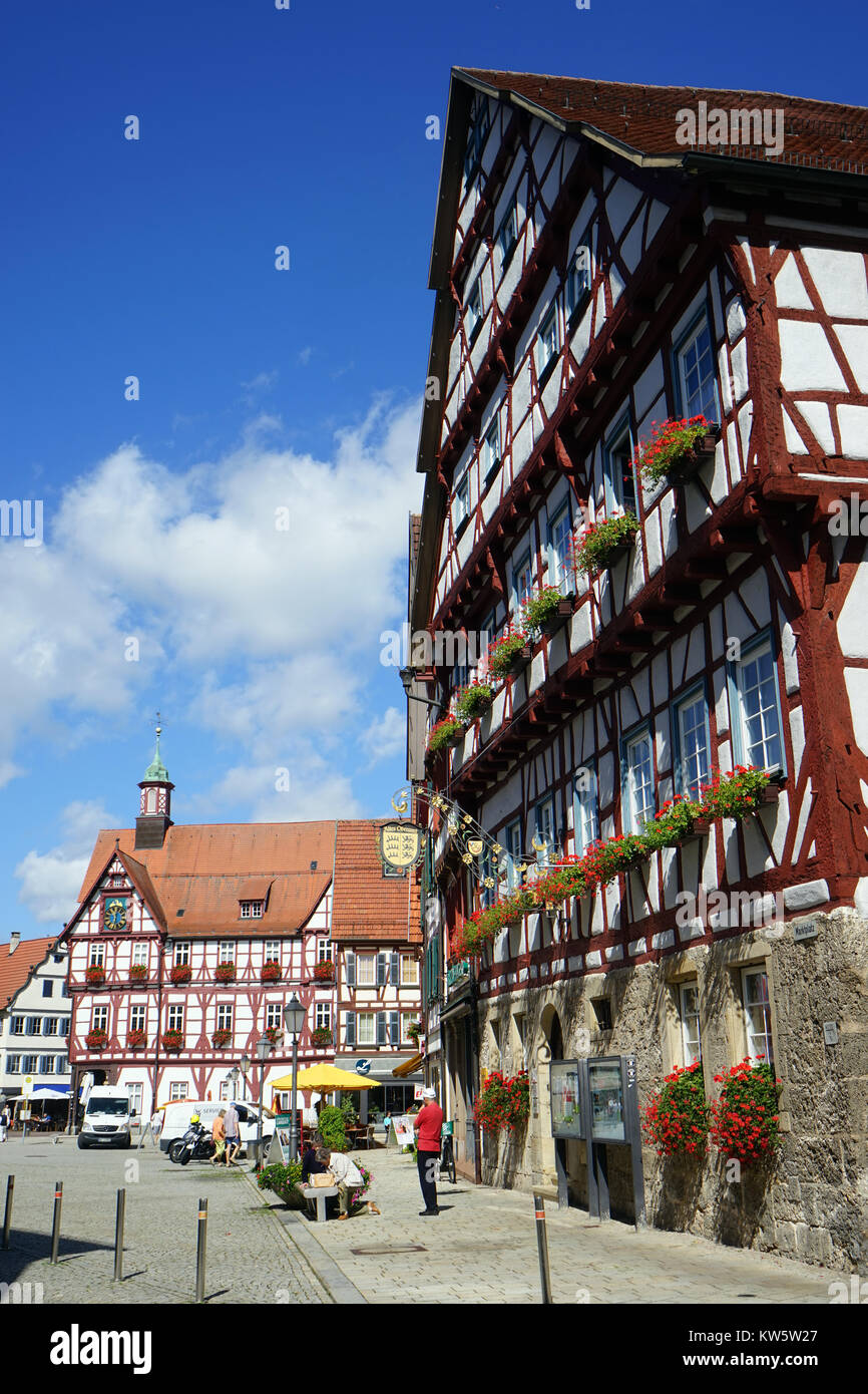 BAD URACH, GERMANY - CIRCA AUGUST 2015 Rathouse and wall of building on ...