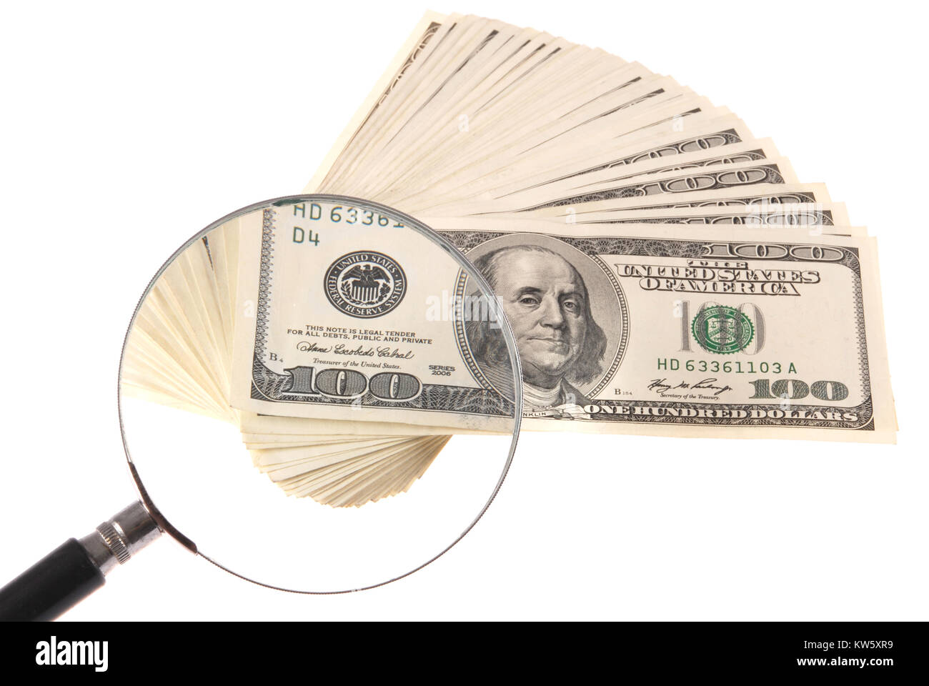 Dollars and magnifying lens on white background Stock Photo - Alamy