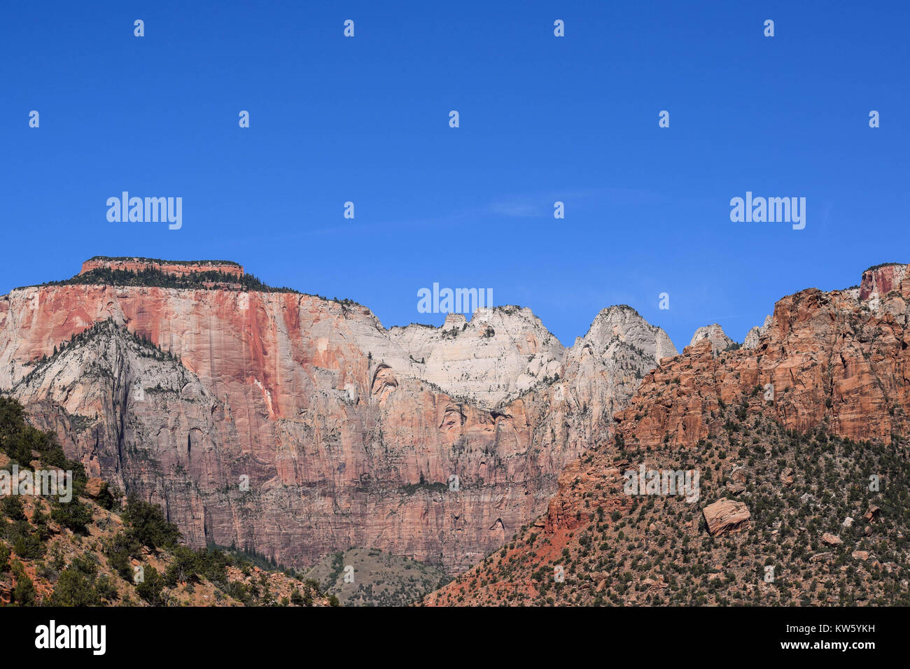 View of a red, white, and grey mountain range, with interesting ...